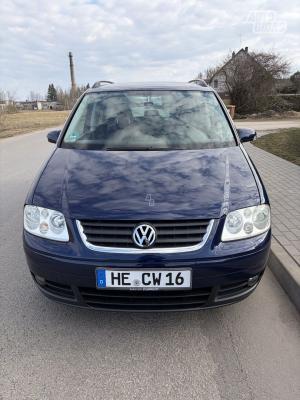 Zils Volkswagen Touran 2006 Lazdijai, ar dzinēja tilpumu 1.90 L un nobraukumu 301 tūkst. km par 2350 €, foto 2 vietnē AUTOMOTO.COM.LV