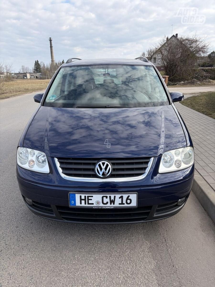 Zils Volkswagen Touran 2006 Lazdijai, ar dzinēja tilpumu 1.90 L un nobraukumu 301 tūkst. km par 2350 €, foto 2 vietnē AUTOMOTO.COM.LV