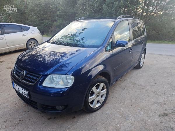 Zils Volkswagen Touran 2006 Viļņa, ar dzinēja tilpumu 1.90 L un nobraukumu 340 tūkst. km par 2200 €, foto 1 vietnē AUTOMOTO.COM.LV
