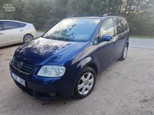 Zils Volkswagen Touran 2006 Viļņa, ar dzinēja tilpumu 1.90 L un nobraukumu 340 tūkst. km par 2200 €, foto  vietnē AUTOMOTO.COM.LV