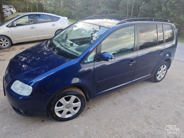 Zils Volkswagen Touran 2006 Viļņa, ar dzinēja tilpumu 1.90 L un nobraukumu 340 tūkst. km par 2200 €, foto 2 vietnē AUTOMOTO.COM.LV