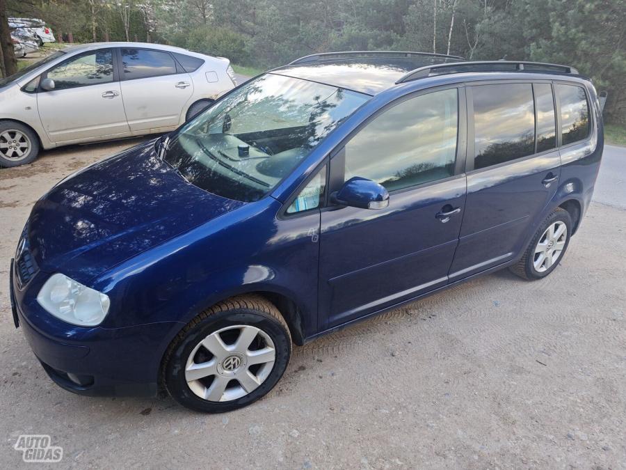 Blue Volkswagen Touran 2006 in Vilnius, with an engine capacity of 1.90 L and mileage of 340 thousand km for 2200 €, photo 3 on AUTOMOTO.COM.LV
