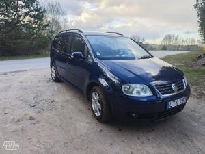 Blue Volkswagen Touran 2006 in Vilnius, with an engine capacity of 1.90 L and mileage of 340 thousand km for 2200 €, photo 4 on AUTOMOTO.COM.LV