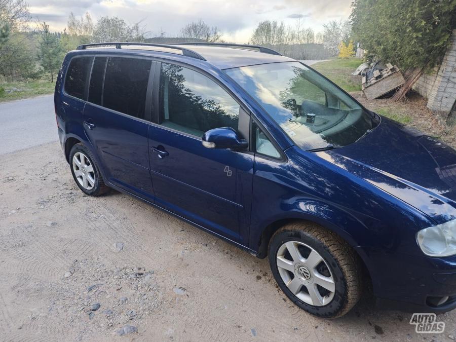 Blue Volkswagen Touran 2006 in Vilnius, with an engine capacity of 1.90 L and mileage of 340 thousand km for 2200 €, photo 5 on AUTOMOTO.COM.LV
