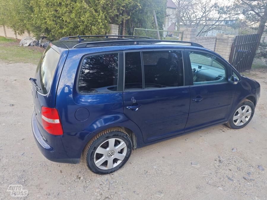 Blue Volkswagen Touran 2006 in Vilnius, with an engine capacity of 1.90 L and mileage of 340 thousand km for 2200 €, photo 6 on AUTOMOTO.COM.LV