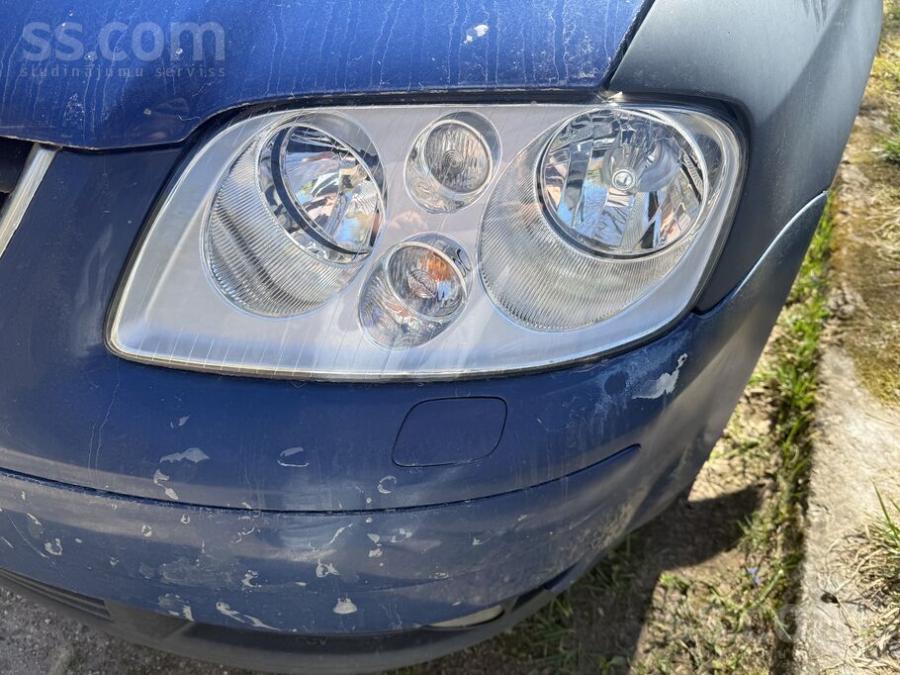 Blue Volkswagen Touran 2006 in Limbazi, with an engine capacity of 2.00 L and mileage of 394 thousand km for 700 €, photo 11 on AUTOMOTO.COM.LV