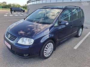 Zils Volkswagen Touran 2006 Viļņa, ar dzinēja tilpumu 2.00 L un nobraukumu 285 tūkst. km par 1800 €, foto  vietnē AUTOMOTO.COM.LV