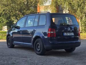 Blue Volkswagen Touran 2006 in Grobiņa, with an engine capacity of 1.90 L and mileage of 302 thousand km for 1600 €, photo 6 on AUTOMOTO.COM.LV