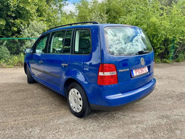 Zils Volkswagen Touran 2006 Viļņa, ar dzinēja tilpumu 1.60 L un nobraukumu 225 tūkst. km par 2199 €, foto 3 vietnē AUTOMOTO.COM.LV