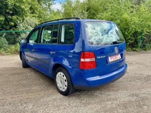 Blue Volkswagen Touran 2006 in Vilnius, with an engine capacity of 1.60 L and mileage of 225 thousand km for 2199 €, photo 4 on AUTOMOTO.COM.LV
