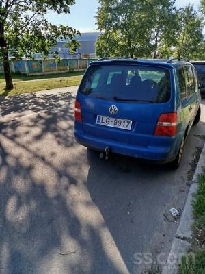 Zils Volkswagen Touran 2006 Rīga, ar dzinēja tilpumu 1.90 L un nobraukumu 320 tūkst. km par 1800 €, foto 4 vietnē AUTOMOTO.COM.LV