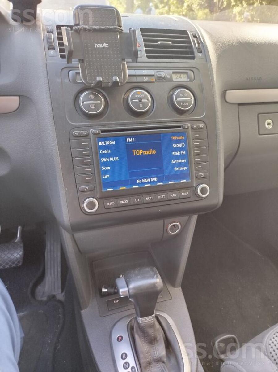 Zils Volkswagen Touran 2006 Rīga, ar dzinēja tilpumu 1.90 L un nobraukumu 320 tūkst. km par 1800 €, foto 9 vietnē AUTOMOTO.COM.LV