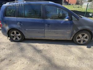 Blue Volkswagen Touran 2006 in Limbazi, with an engine capacity of 2.00 L and mileage of 394 thousand km for 500 €, photo 4 on AUTOMOTO.COM.LV