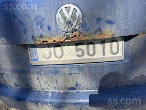 Blue Volkswagen Touran 2006 in Limbazi, with an engine capacity of 2.00 L and mileage of 394 thousand km for 500 €, photo 6 on AUTOMOTO.COM.LV