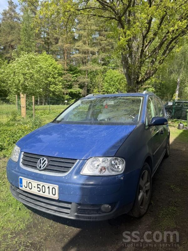 Blue Volkswagen Touran 2006 in Limbazi, with an engine capacity of 2.00 L and mileage of 394 thousand km for 500 €, photo 10 on AUTOMOTO.COM.LV