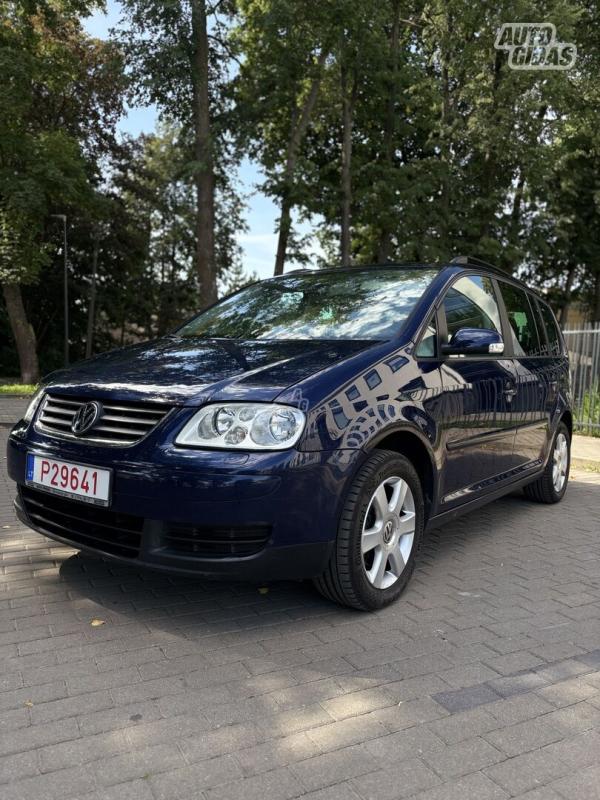 Blue Volkswagen Touran 2006 in Kaunas, with an engine capacity of 1.90 L and mileage of 298 thousand km for 2200 €, photo 1 on AUTOMOTO.COM.LV