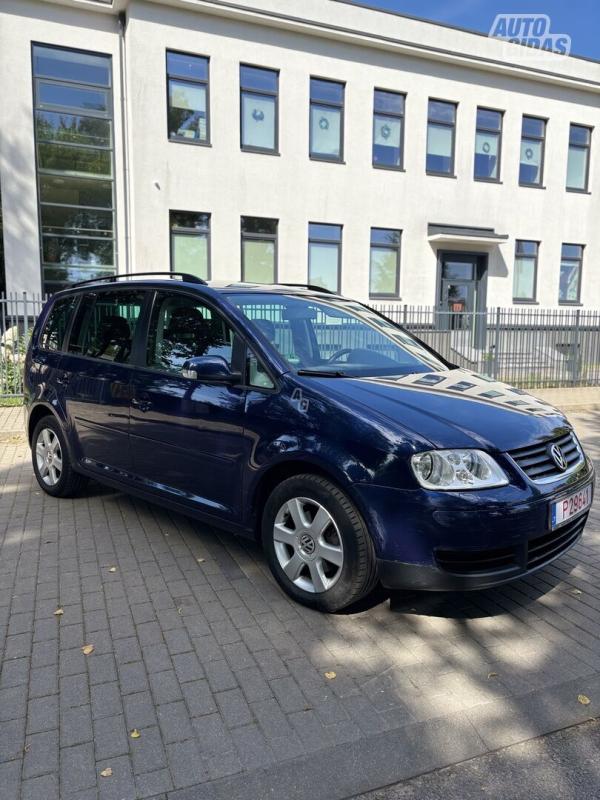 Blue Volkswagen Touran 2006 in Kaunas, with an engine capacity of 1.90 L and mileage of 298 thousand km for 2200 €, photo 5 on AUTOMOTO.COM.LV