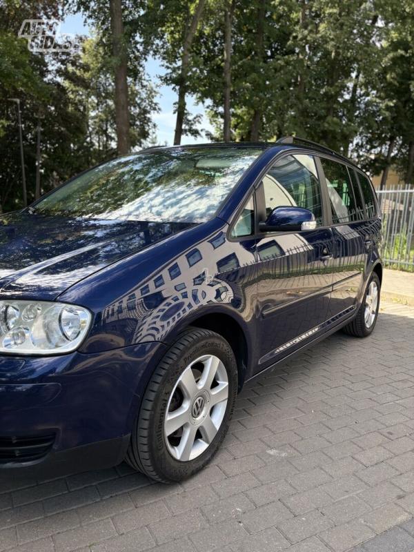 Blue Volkswagen Touran 2006 in Kaunas, with an engine capacity of 1.90 L and mileage of 298 thousand km for 2200 €, photo 6 on AUTOMOTO.COM.LV