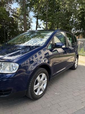 Zils Volkswagen Touran 2006 Kauņa, ar dzinēja tilpumu 1.90 L un nobraukumu 298 tūkst. km par 2200 €, foto 7 vietnē AUTOMOTO.COM.LV