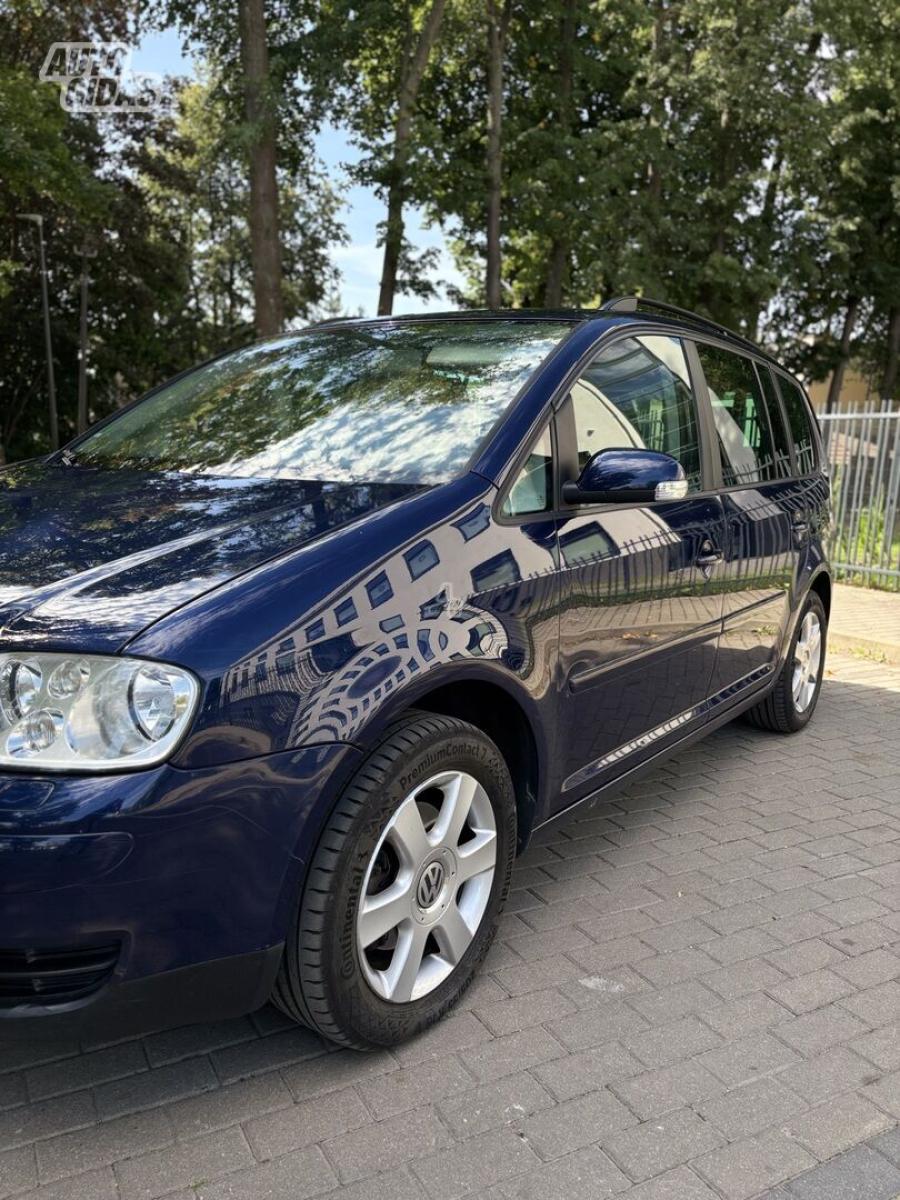 Zils Volkswagen Touran 2006 Kauņa, ar dzinēja tilpumu 1.90 L un nobraukumu 298 tūkst. km par 2200 €, foto 7 vietnē AUTOMOTO.COM.LV