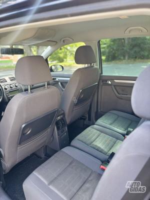 Zils Volkswagen Touran 2006 Kauņa, ar dzinēja tilpumu 1.90 L un nobraukumu 298 tūkst. km par 2200 €, foto 14 vietnē AUTOMOTO.COM.LV