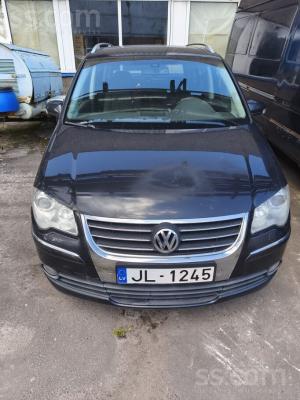 Blue Volkswagen Touran 2006 in Riga, with an engine capacity of 2.00 L and mileage of 390 thousand km for 1000 €, photo  on AUTOMOTO.COM.LV
