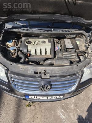 Blue Volkswagen Touran 2006 in Riga, with an engine capacity of 2.00 L and mileage of 390 thousand km for 1000 €, photo 8 on AUTOMOTO.COM.LV