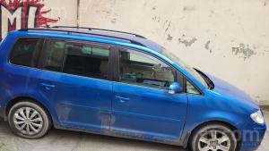 Blue Volkswagen Touran 2006 in Riga, with an engine capacity of 1.90 L and mileage of 320 thousand km for 1450 €, photo 7 on AUTOMOTO.COM.LV