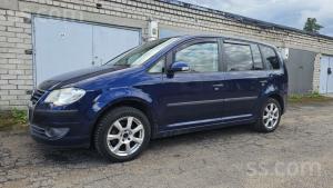 Blue Volkswagen Touran 2006 in Riga, with an engine capacity of 1.40 L and mileage of 250 thousand km for 2150 €, photo 1 on AUTOMOTO.COM.LV
