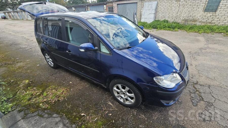 Blue Volkswagen Touran 2006 in Riga, with an engine capacity of 1.40 L and mileage of 250 thousand km for 2150 €, photo 3 on AUTOMOTO.COM.LV