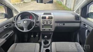 Blue Volkswagen Touran 2006 in Riga, with an engine capacity of 1.40 L and mileage of 250 thousand km for 2150 €, photo 6 on AUTOMOTO.COM.LV