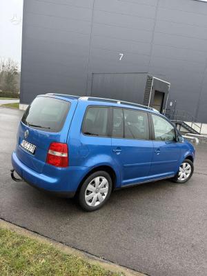Zils Volkswagen Touran 2007 Kauņa, ar dzinēja tilpumu 1.97 L un nobraukumu 340 tūkst. km par 1700 €, foto 4 vietnē AUTOMOTO.COM.LV