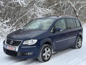 Blue Volkswagen Touran 2007 in Mazeikiai, with an engine capacity of 1.90 L and mileage of 264 thousand km for 1200 €, photo 8 on AUTOMOTO.COM.LV