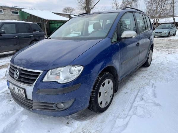 Blue Volkswagen Touran 2007 in Palanga, with an engine capacity of 1.39 L and mileage of 295 thousand km for 999 €, photo 9 on AUTOMOTO.COM.LV