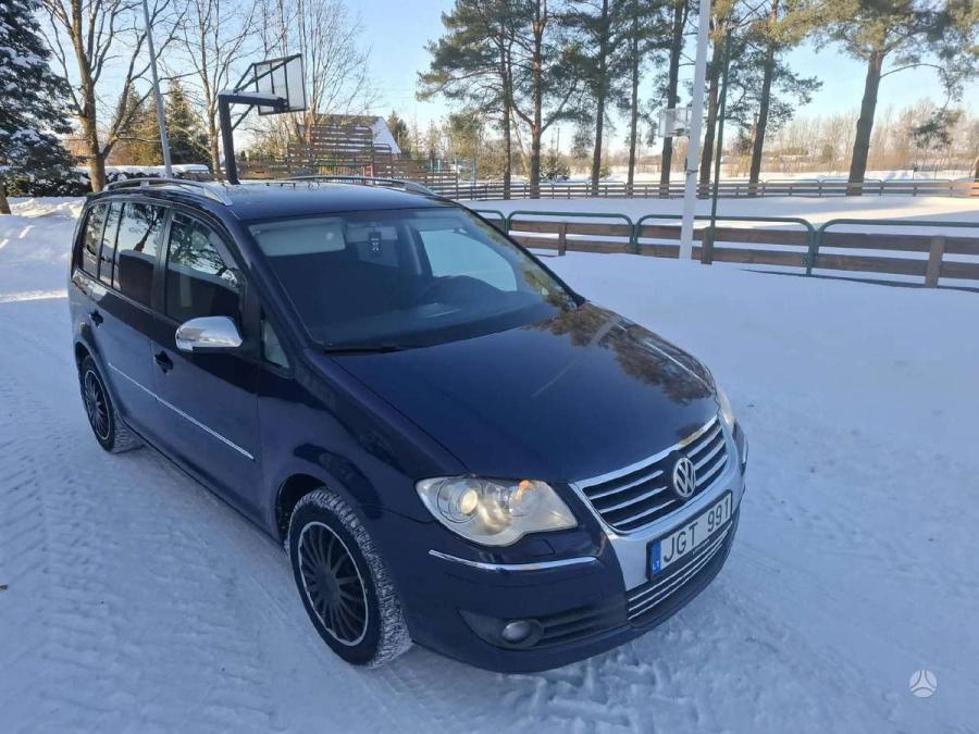 Blue Volkswagen Touran 2007 in Kaunas, with an engine capacity of 1.90 L and mileage of 322 thousand km for 2350 €, photo 3 on AUTOMOTO.COM.LV