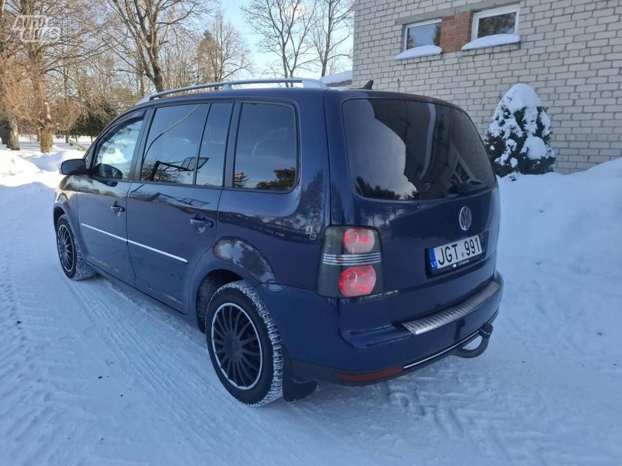Blue Volkswagen Touran 2007 in Kaunas, with an engine capacity of 1.90 L and mileage of 288 thousand km for 2350 €, photo 3 on AUTOMOTO.COM.LV