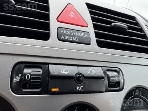 Zils Volkswagen Touran 2007 Jelgava, ar dzinēja tilpumu 2.00 L un nobraukumu 0 tūkst. km par 4899 €, foto 17 vietnē AUTOMOTO.COM.LV