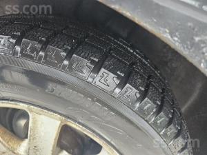 Zils Volkswagen Touran 2007 Rīga, ar dzinēja tilpumu 2.00 L un nobraukumu 345 tūkst. km par 1000 €, foto 11 vietnē AUTOMOTO.COM.LV