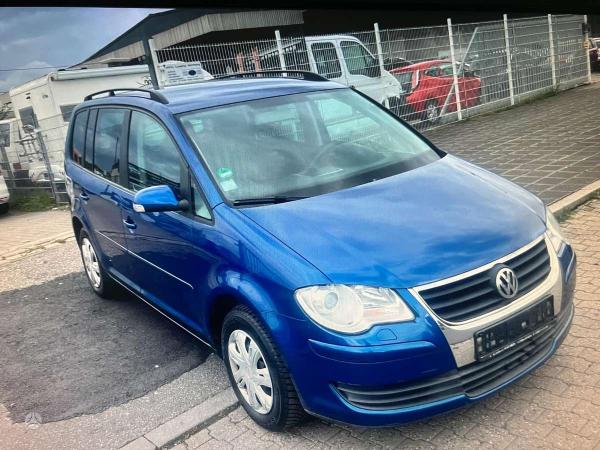 Zils Volkswagen Touran 2007 Prienai, ar dzinēja tilpumu 1.60 L un nobraukumu 188 tūkst. km par 2222 €, foto 1 vietnē AUTOMOTO.COM.LV
