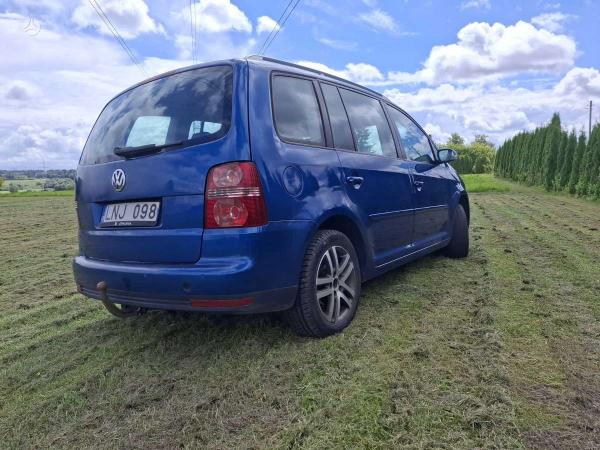 Zils Volkswagen Touran 2007 Kauņa, ar dzinēja tilpumu 1.97 L un nobraukumu 292 tūkst. km par 2900 €, foto 6 vietnē AUTOMOTO.COM.LV