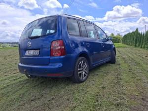 Blue Volkswagen Touran 2007 in Kaunas, with an engine capacity of 1.97 L and mileage of 292 thousand km for 2900 €, photo 7 on AUTOMOTO.COM.LV