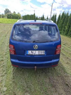Blue Volkswagen Touran 2007 in Kaunas, with an engine capacity of 1.97 L and mileage of 292 thousand km for 2900 €, photo 9 on AUTOMOTO.COM.LV