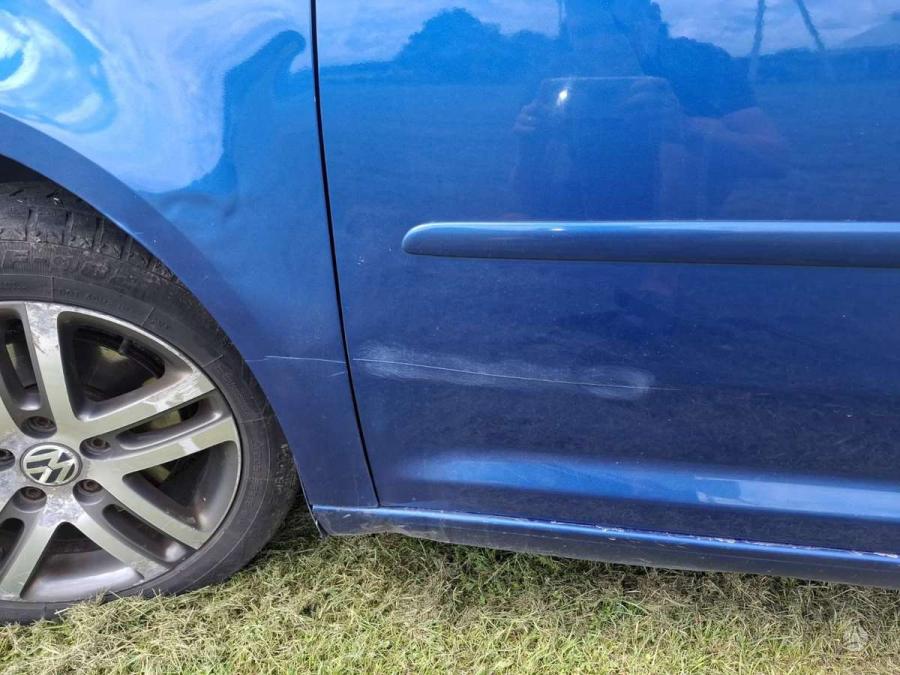 Blue Volkswagen Touran 2007 in Kaunas, with an engine capacity of 1.97 L and mileage of 292 thousand km for 2900 €, photo 11 on AUTOMOTO.COM.LV