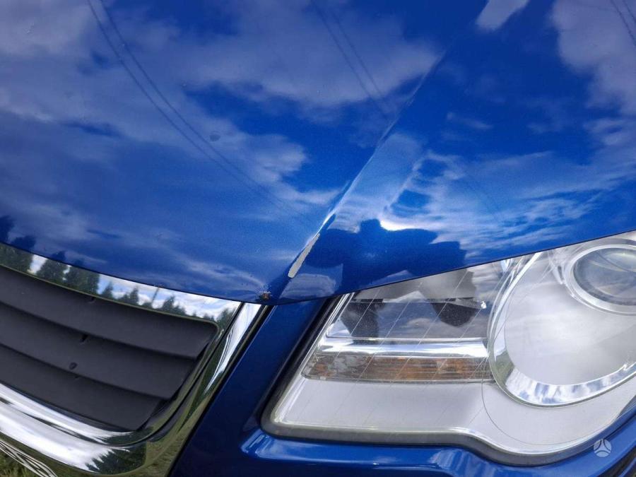 Blue Volkswagen Touran 2007 in Kaunas, with an engine capacity of 1.97 L and mileage of 292 thousand km for 2900 €, photo 14 on AUTOMOTO.COM.LV