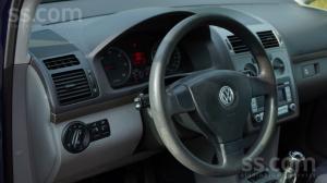 Blue Volkswagen Touran 2007 in Jelgava, with an engine capacity of 1.90 L and mileage of 385 thousand km for 1600 €, photo 6 on AUTOMOTO.COM.LV