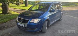 Blue Volkswagen Touran 2007 in Riga, with an engine capacity of 2.00 L and mileage of 445 thousand km for 500 €, photo  on AUTOMOTO.COM.LV
