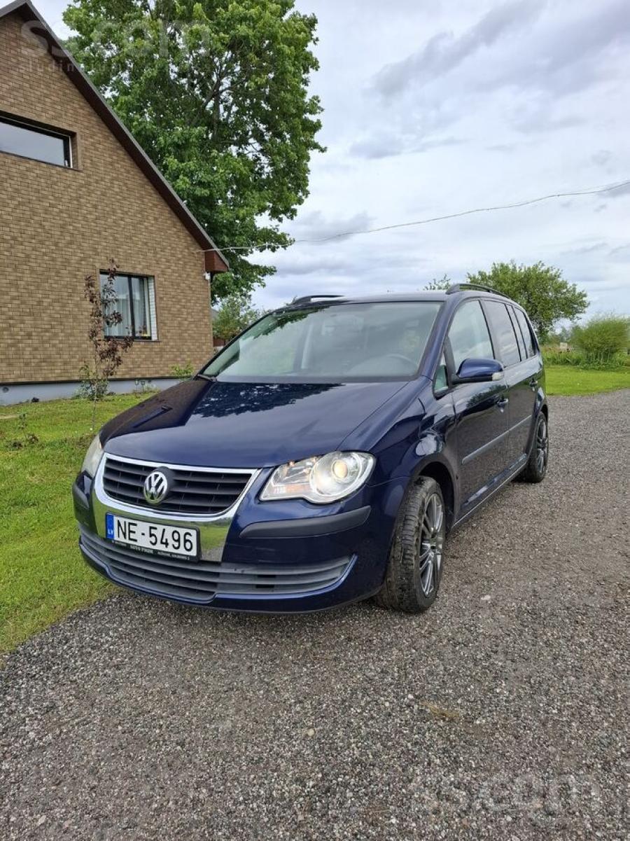 Zils Volkswagen Touran 2008 Balvi, ar dzinēja tilpumu 1.40 L un nobraukumu 298 tūkst. km par 3500 €, foto 1 vietnē AUTOMOTO.COM.LV