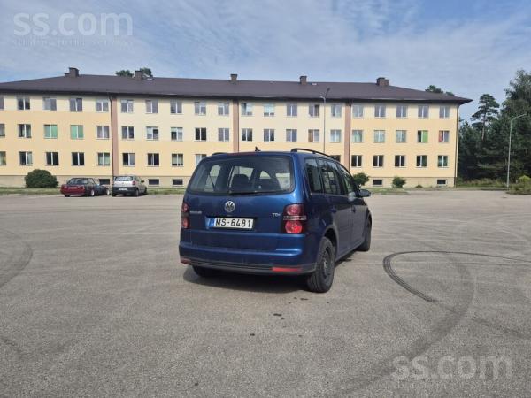 Zils Volkswagen Touran 2008 Rīga, ar dzinēja tilpumu 1.90 L un nobraukumu 269 tūkst. km par 1600 €, foto 3 vietnē AUTOMOTO.COM.LV