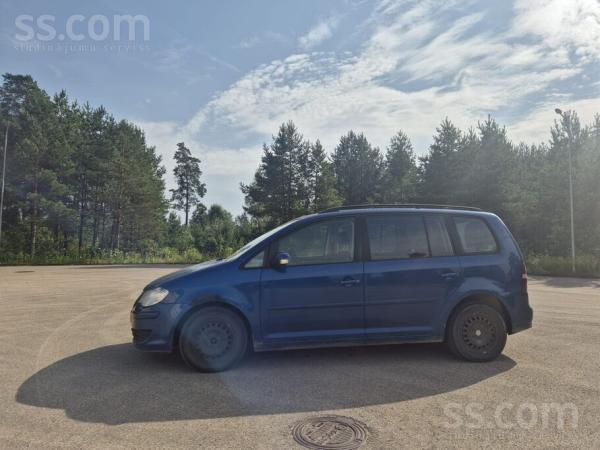 Zils Volkswagen Touran 2008 Rīga, ar dzinēja tilpumu 1.90 L un nobraukumu 269 tūkst. km par 1600 €, foto 4 vietnē AUTOMOTO.COM.LV