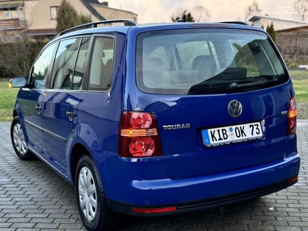Blue Volkswagen Touran 2008 in Kaunas, with an engine capacity of 1.90 L and mileage of 250 thousand km for 3550 €, photo 2 on AUTOMOTO.COM.LV